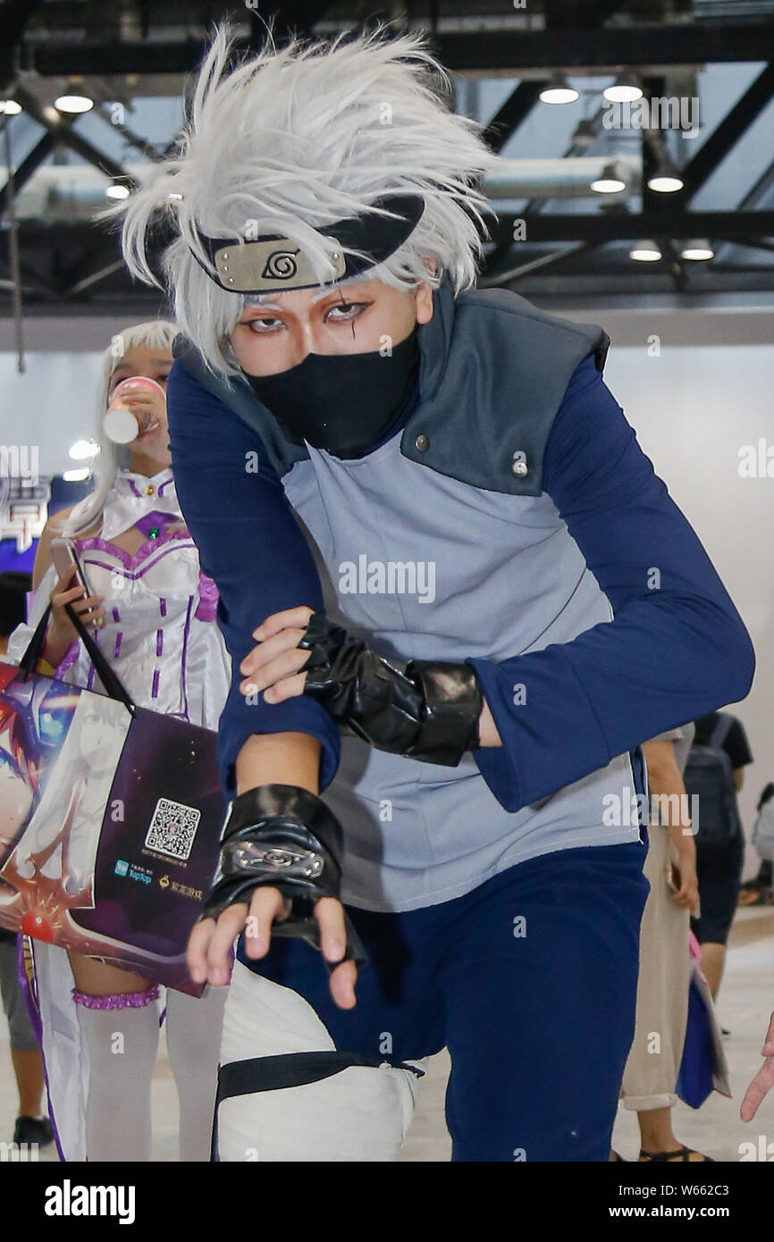 A Chinese coser dressed in cosplay costume poses during the Beijing ...