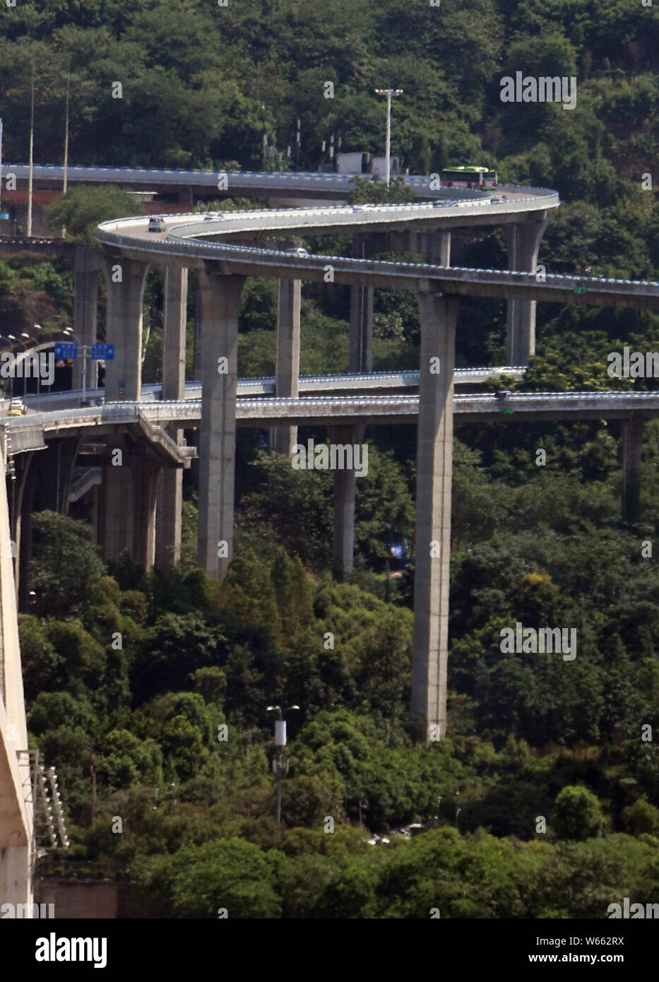 Cars drive on China's tallest highway interchange, Sujiaba Interchange ...