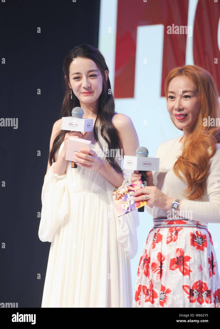 Chinese Uigur actress Dilraba Dilmurat, right, attends a promotional ...