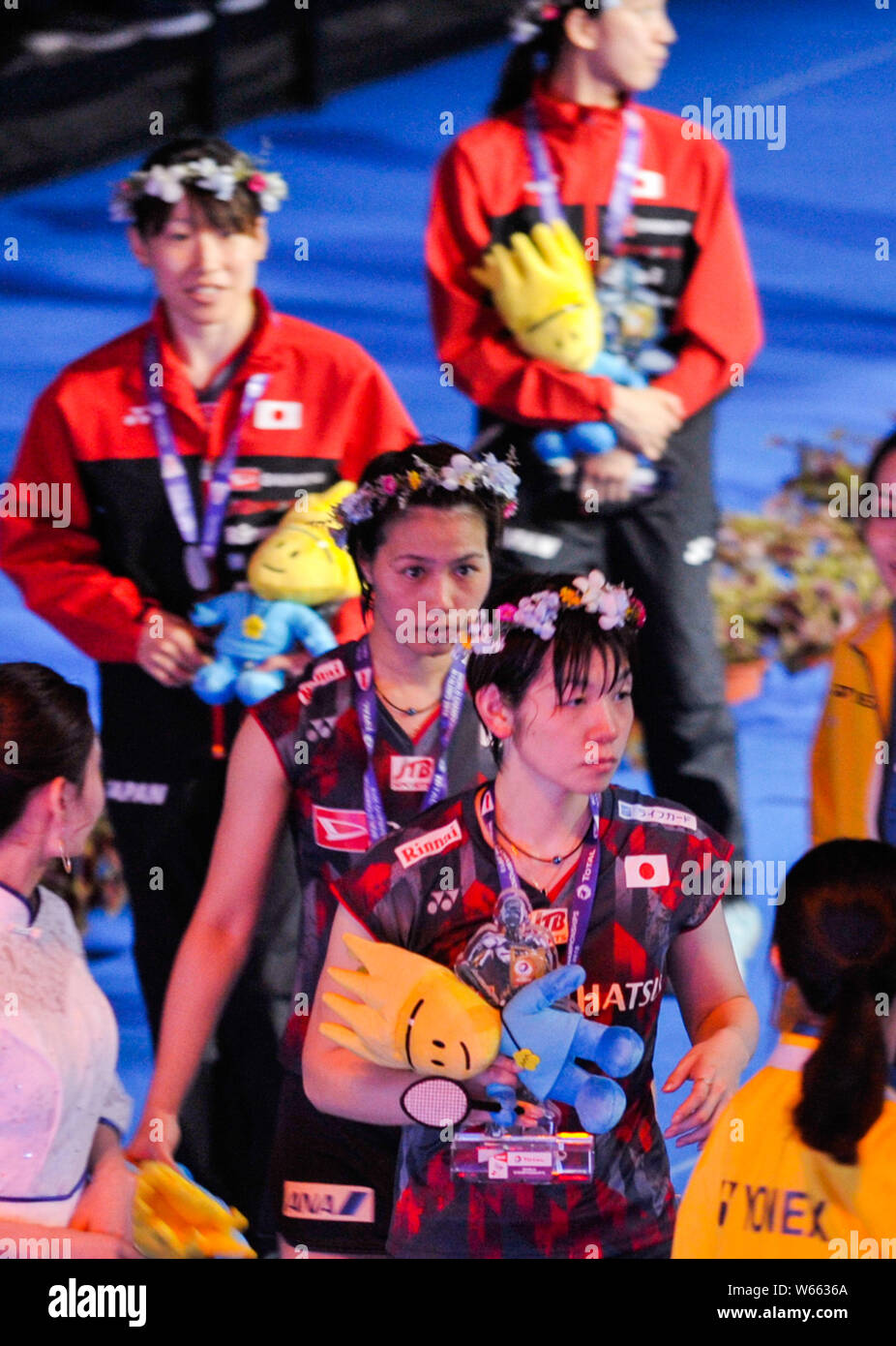 First-runner up Sayaka Hirota of Japan, front, and Yuki Fukushima pose ...