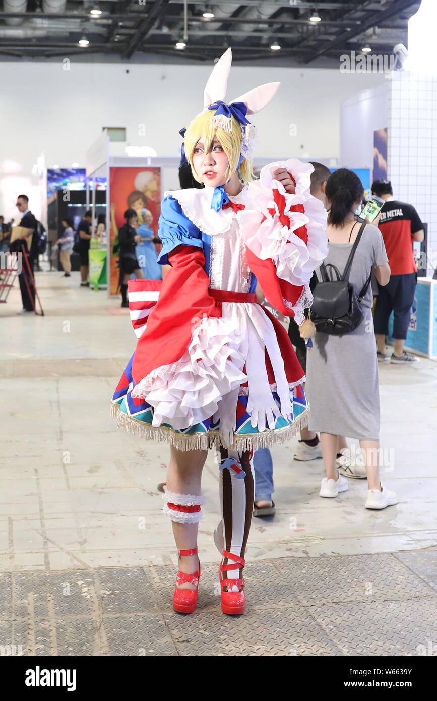 A Chinese coser dressed in cosplay costume poses during the Beijing ...