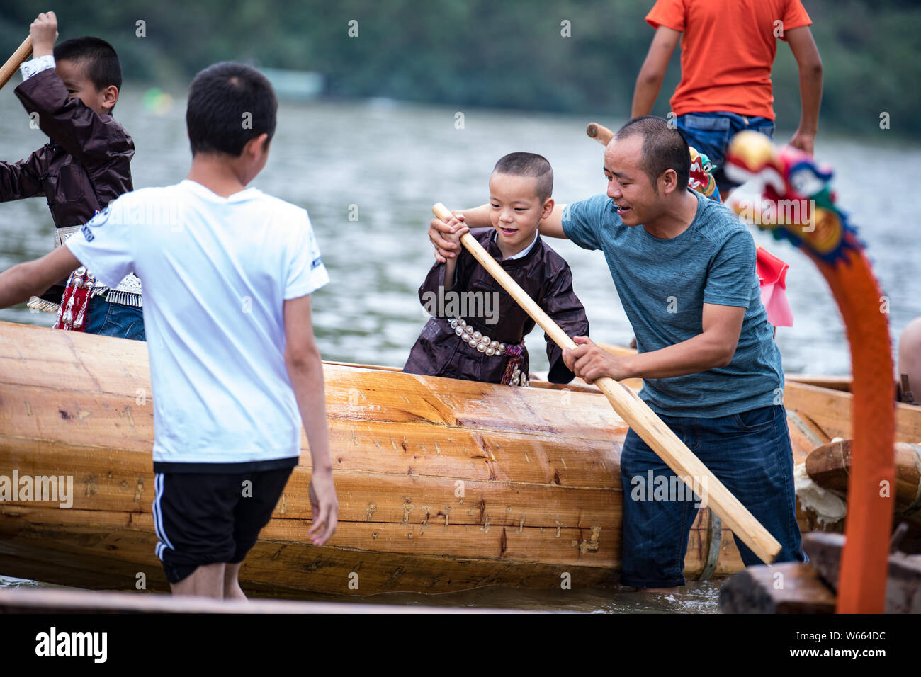 Chinese people of Miao ethnic minority celebrate the Miao Dragon Boat ...