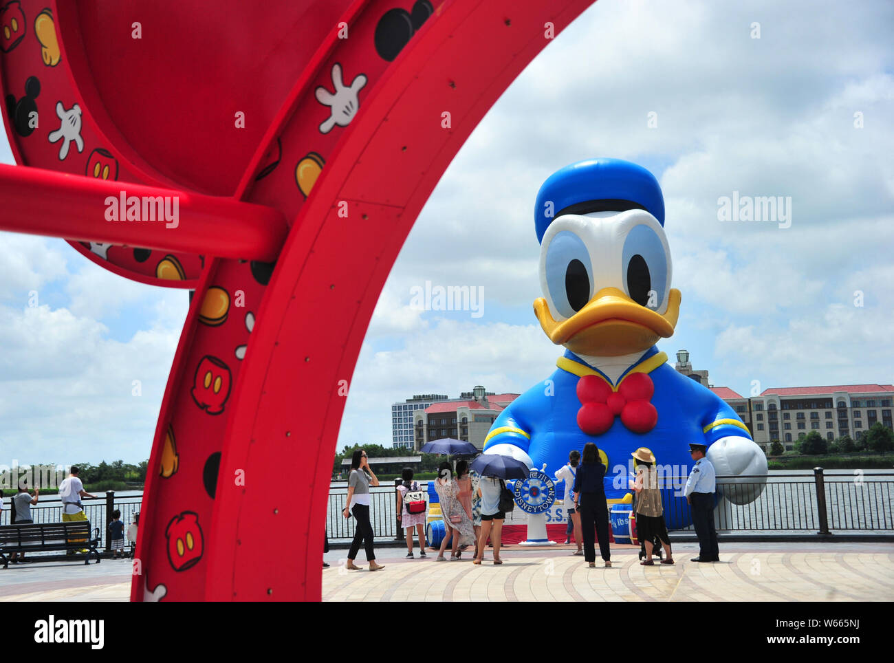 An 11-meter-tall inflatable Donald Duck is on display at the lakeside ...