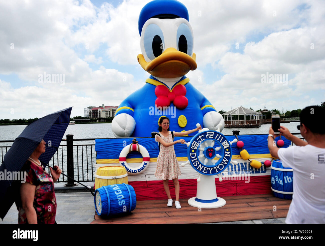 An 11-meter-tall inflatable Donald Duck is on display at the lakeside ...