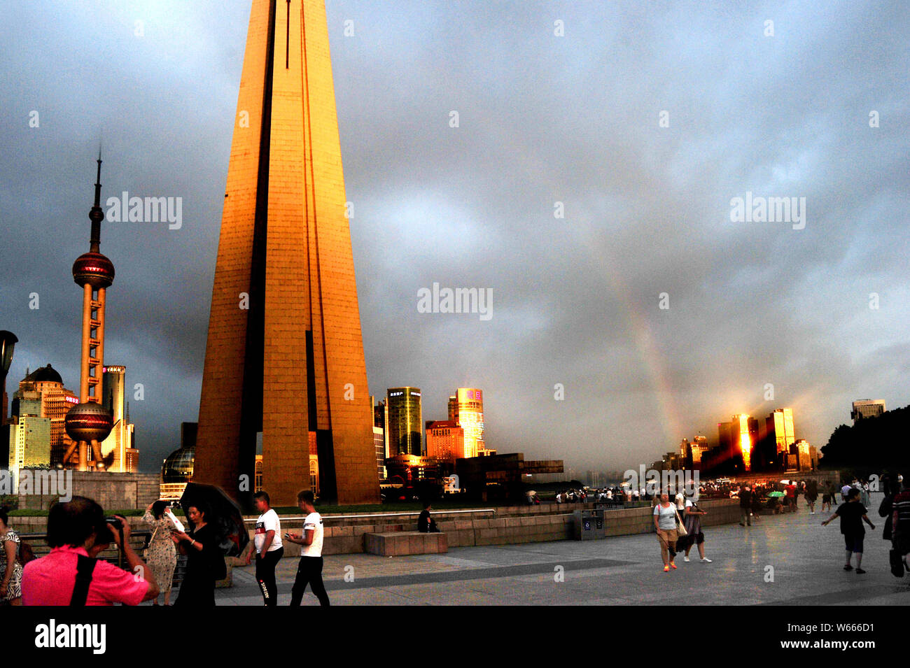 A double rainbow appears above the Oriental Pearl TV Tower in the sky ...