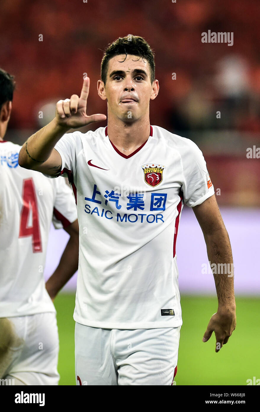 Brazilian football player Oscar of Shanghai SIPG celebrates after ...