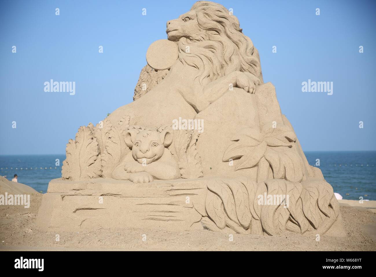 A sand sculpture of characters from the American animated film "The ...