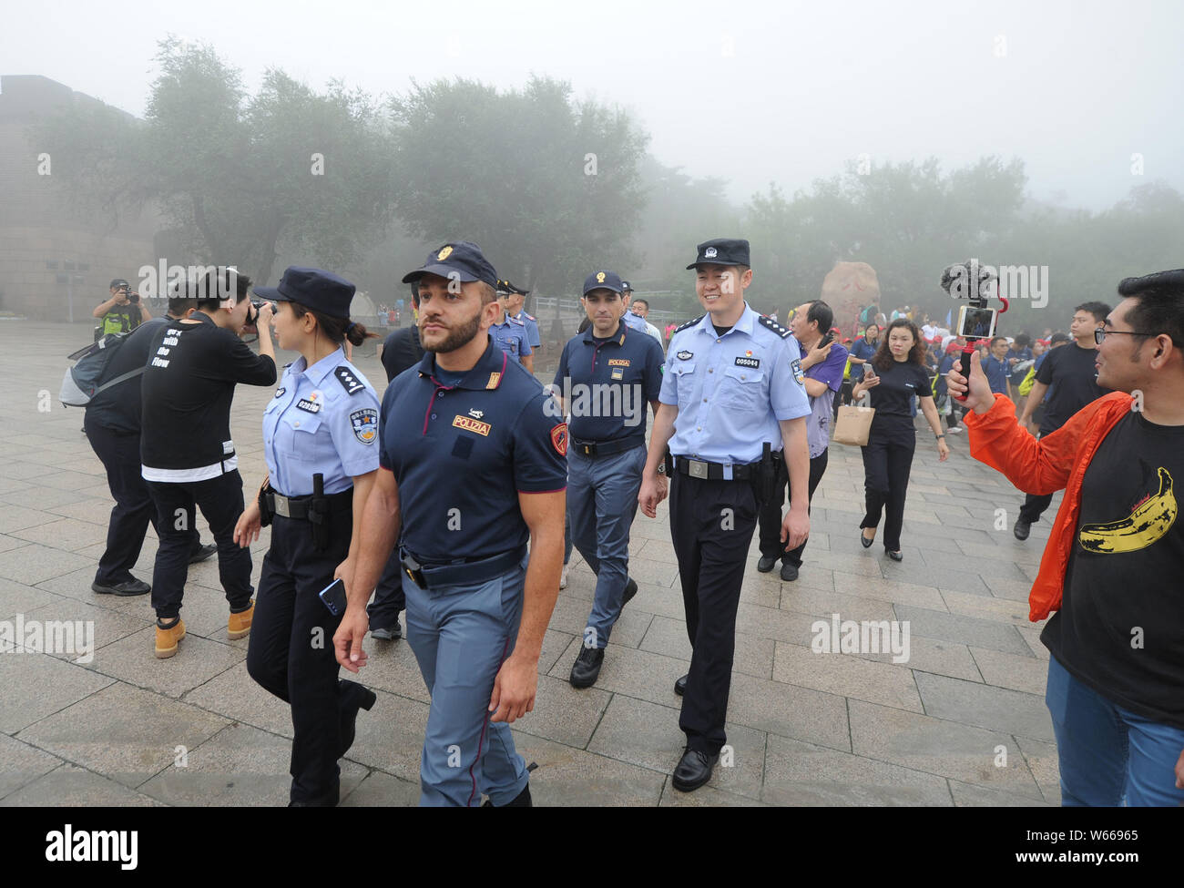 Italian police officers conduct joint patrols with Chinese police ...