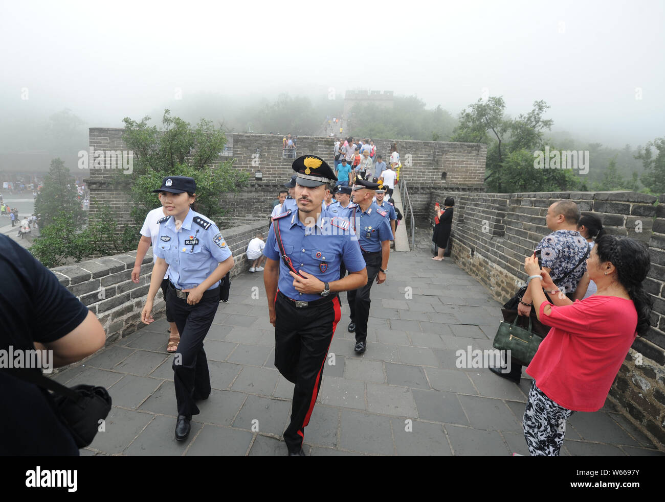 Italian police officers conduct joint patrols with Chinese police ...