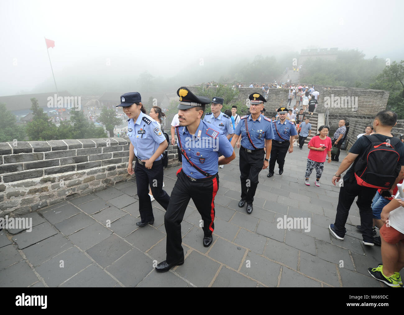 Italian police officers conduct joint patrols with Chinese police ...