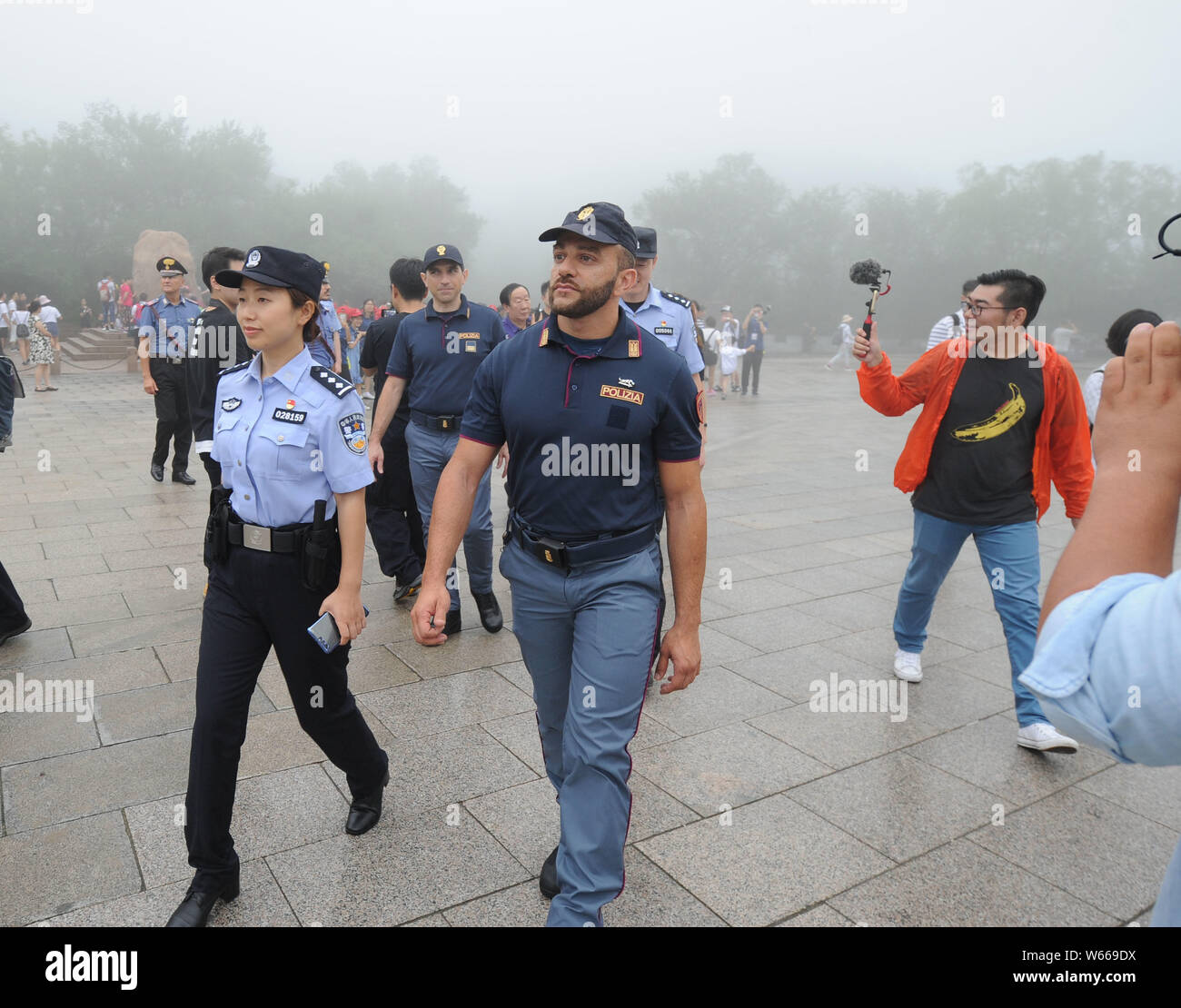 Italian police officers conduct joint patrols with Chinese police ...
