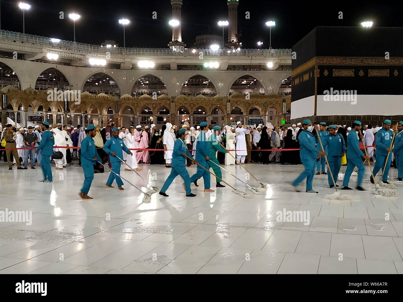 July 30, 2019, Mecca, Jedddah, Saudi Arabia: Workers clean the floor of ...