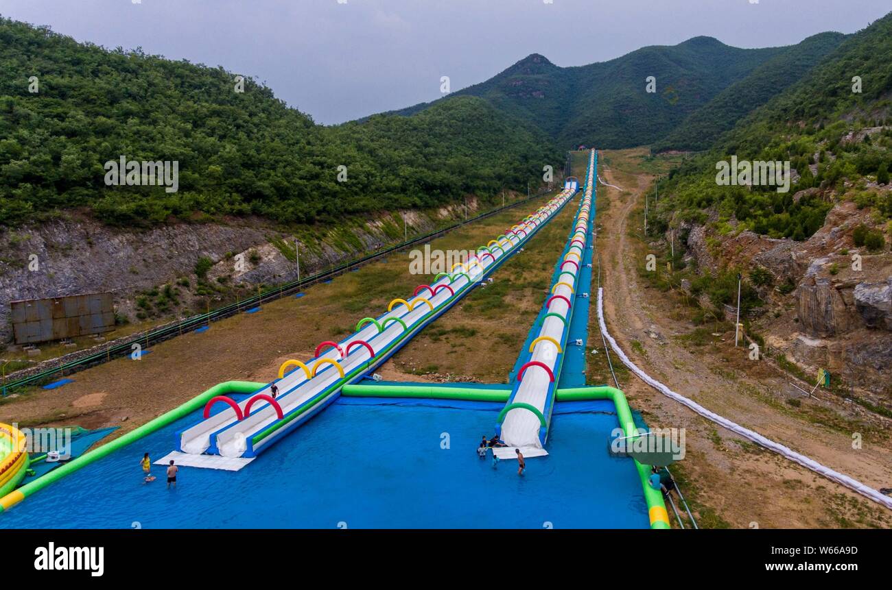 View of Asia's longest water slide at Jingzhihu Resort in Beijing ...