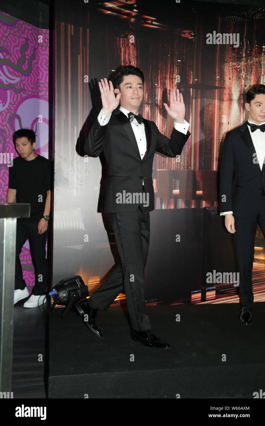 Taiwanese actor Wallace Huo attends an unveiling ceremony for a wax ...