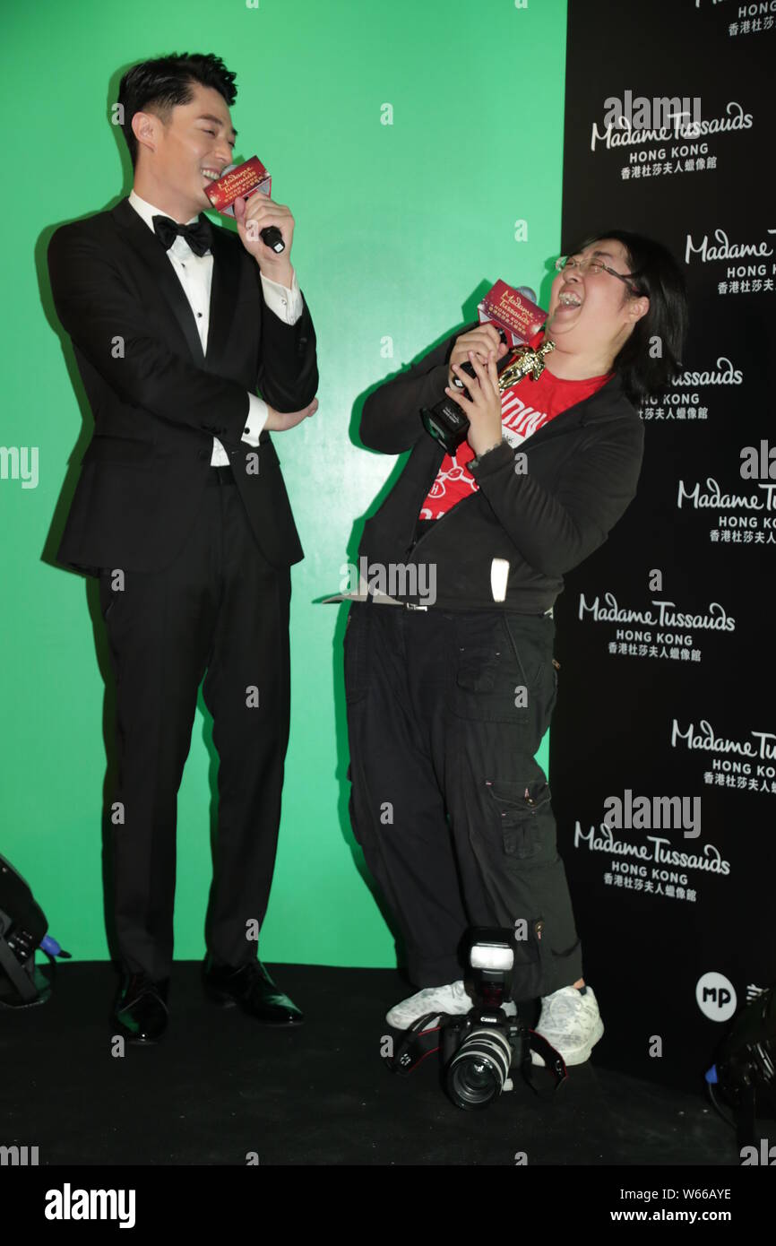 Taiwanese actor Wallace Huo attends an unveiling ceremony for a wax ...