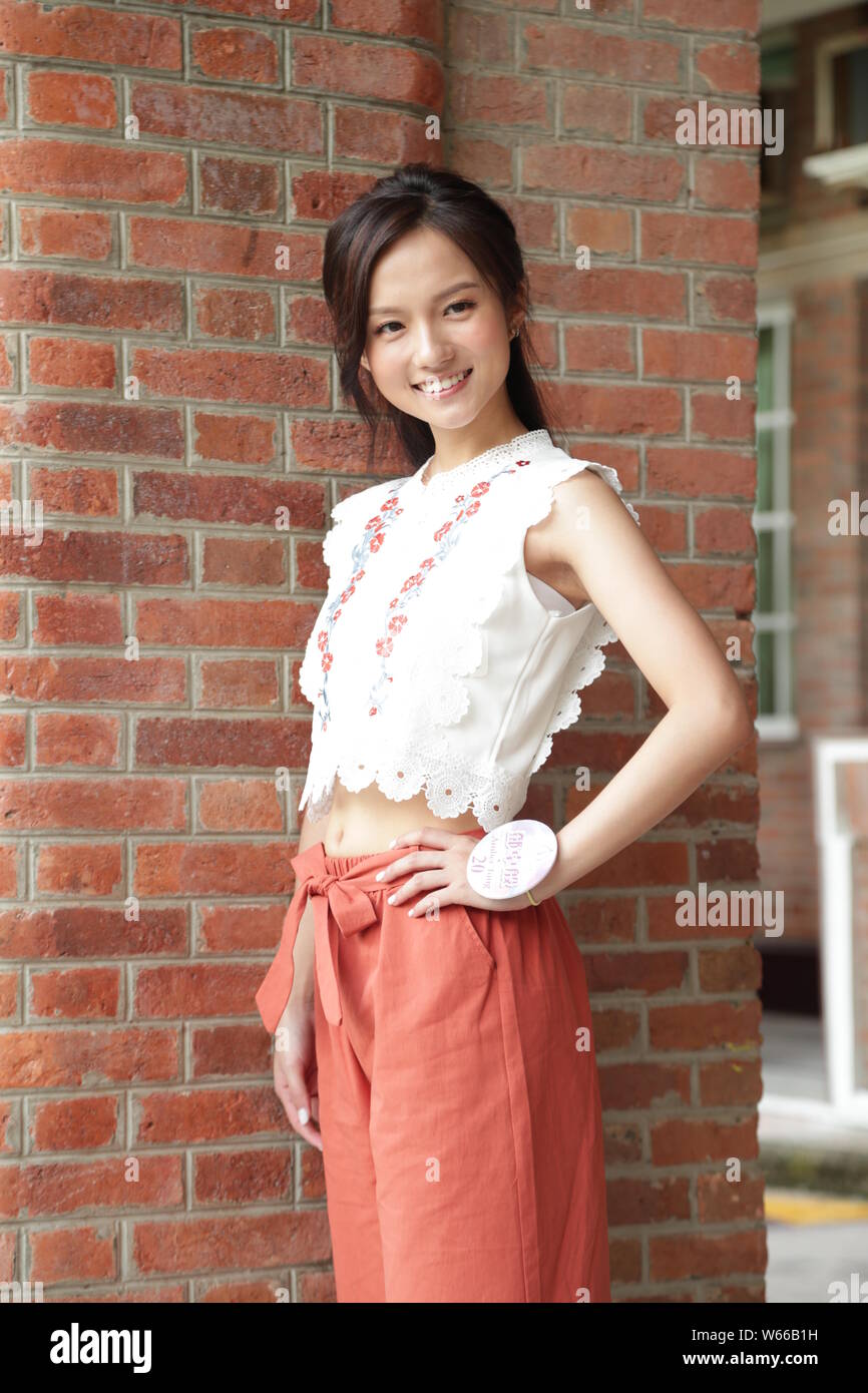 No.20 contestant Amber Tang poses during a photocall for the Miss Hong ...