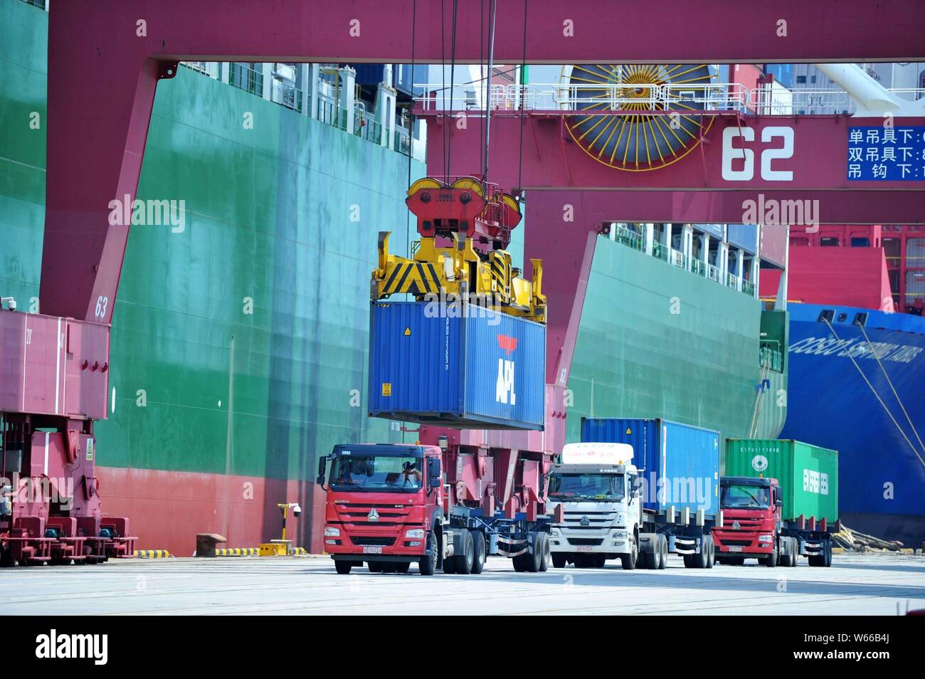 Crane vehicle lifts container hi-res stock photography and images - Alamy