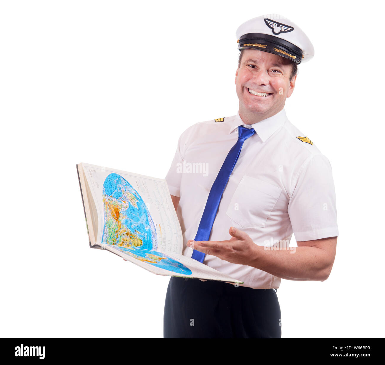 Aircraft captain is studying a atlas of earth.The happy pilot show maps ...