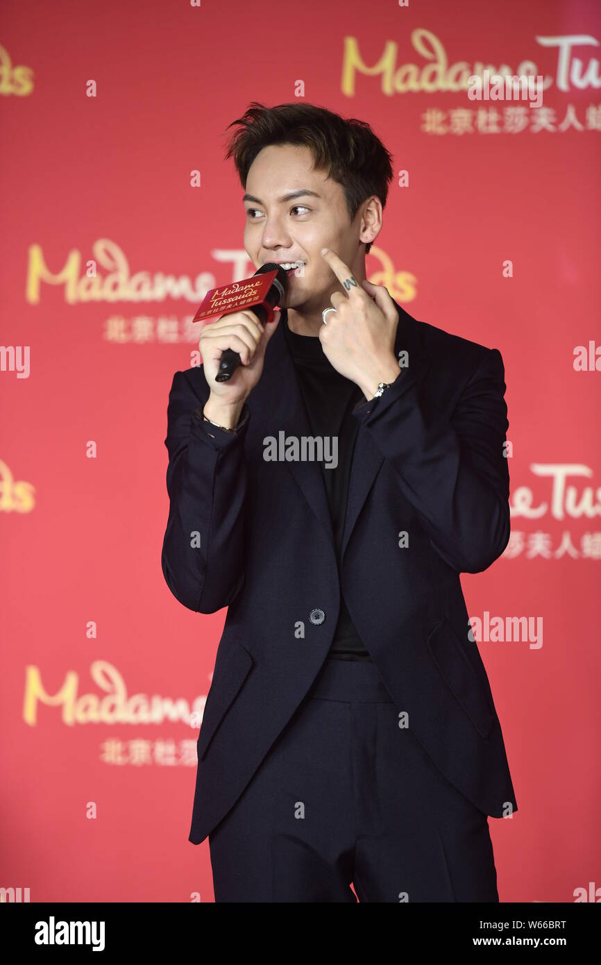 Hong Kong singer and actor William Chan poses during an unveiling ...