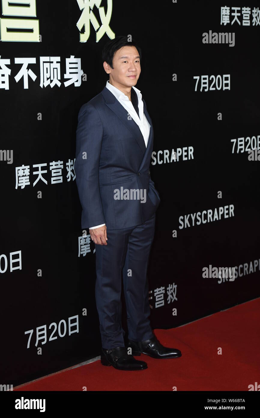 Singaporean actor Ng Chin Han arrives on the red carpet for a premiere ...