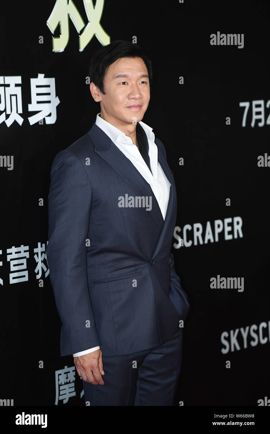 Singaporean actor Ng Chin Han arrives on the red carpet for a premiere ...