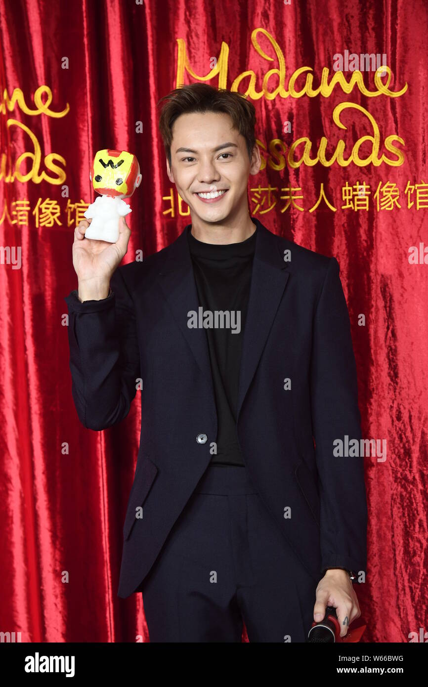Hong Kong singer and actor William Chan poses during an unveiling ...