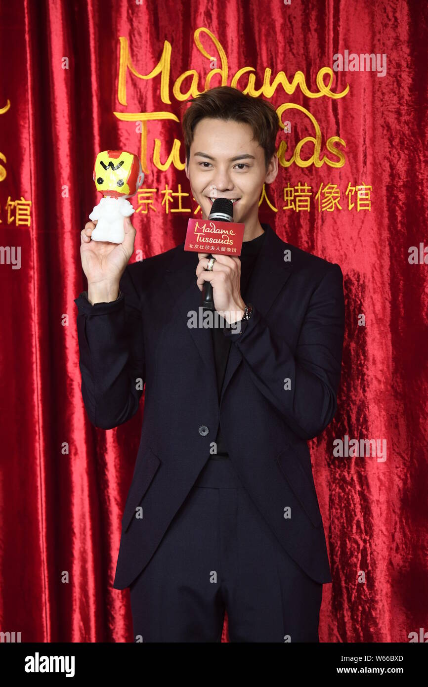 Hong Kong singer and actor William Chan poses during an unveiling ...