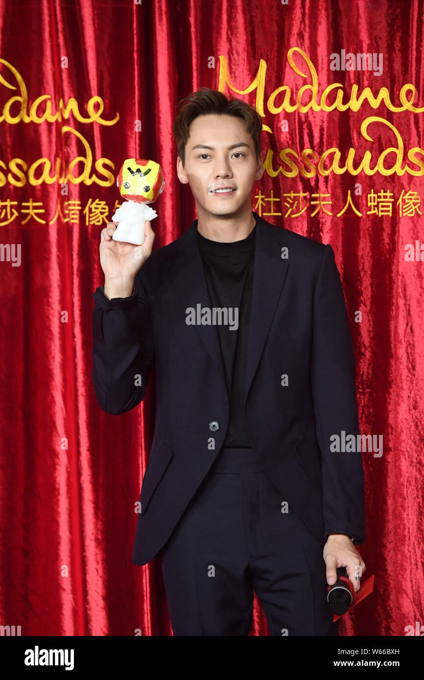Hong Kong singer and actor William Chan poses during an unveiling ...