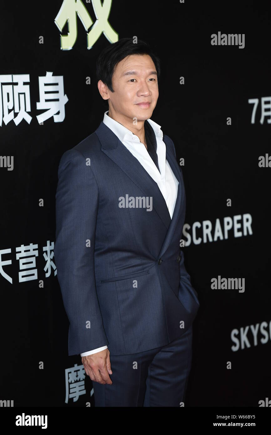 Singaporean actor Ng Chin Han arrives on the red carpet for a premiere ...