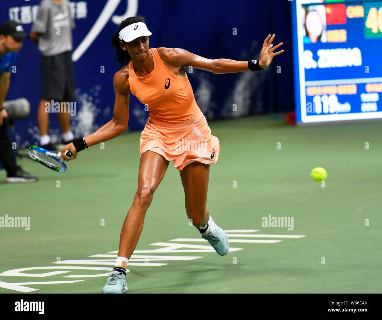 Karman Kaur Thandi of India returns a shot to Zheng Saisai of China in ...