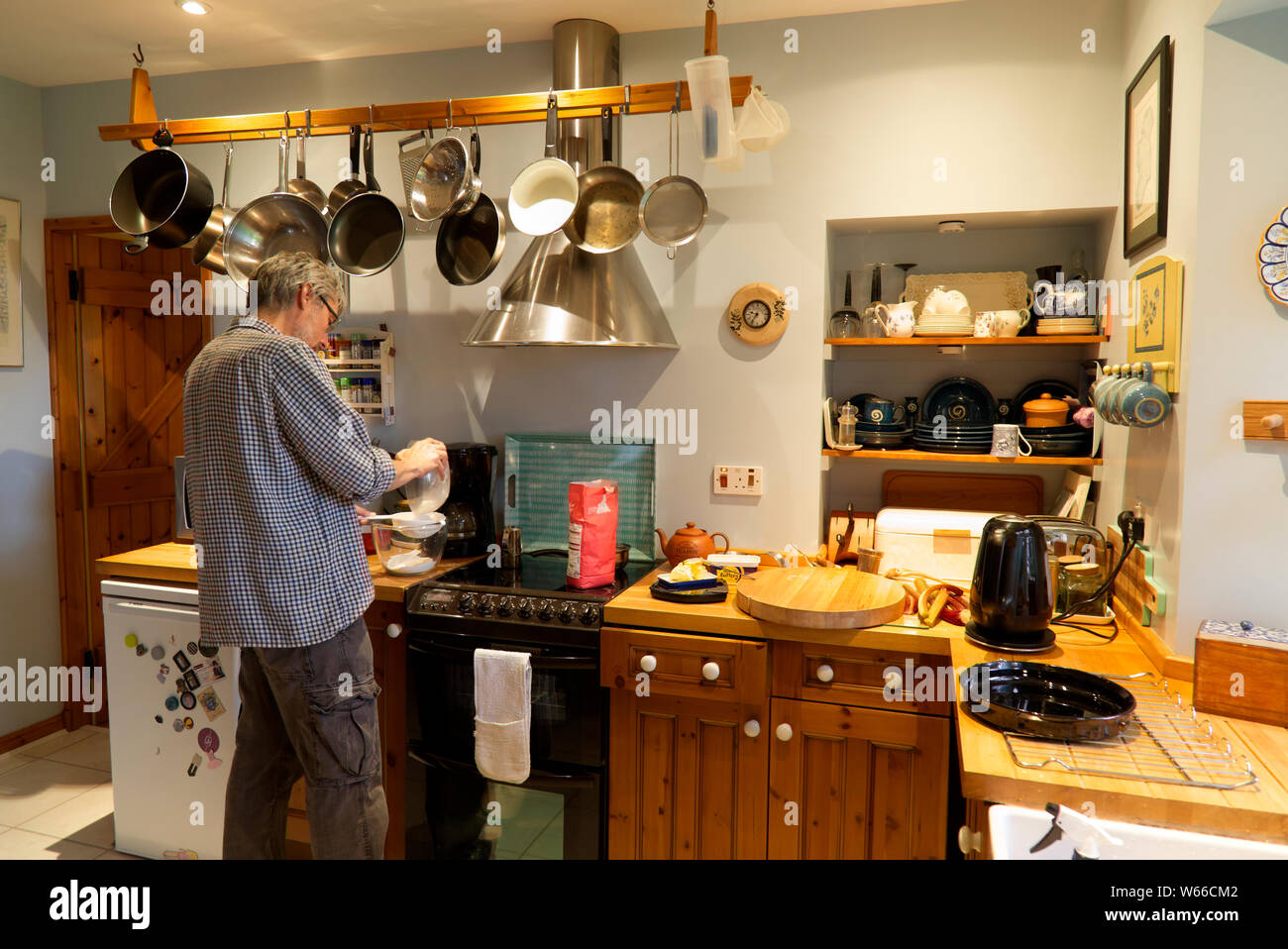 Man baking in kitchen hi-res stock photography and images - Alamy