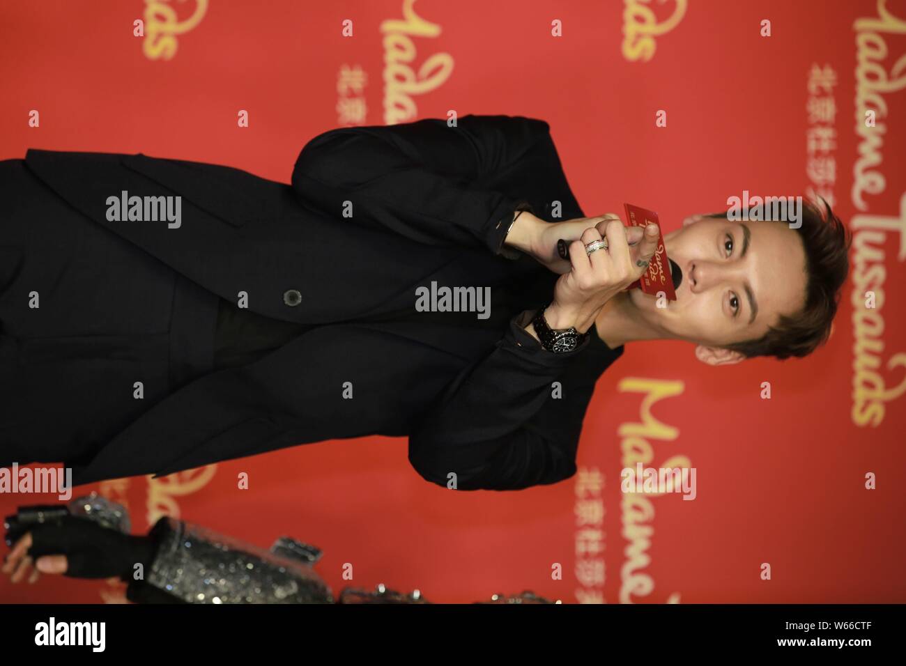 Hong Kong singer and actor William Chan poses during an unveiling ...