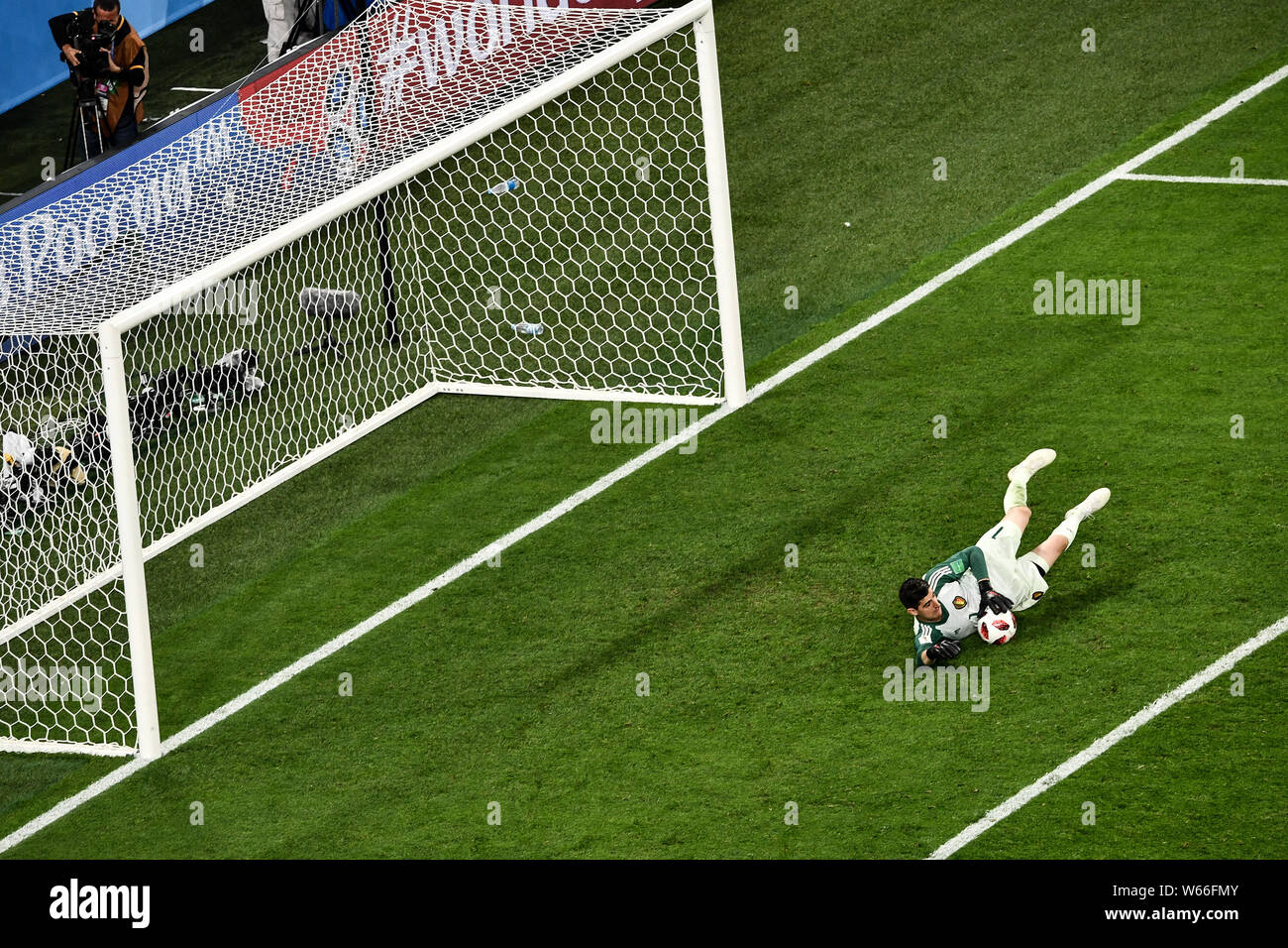 Goalkeeper Thibaut Courtois of Belgium saves a shot by France in their ...