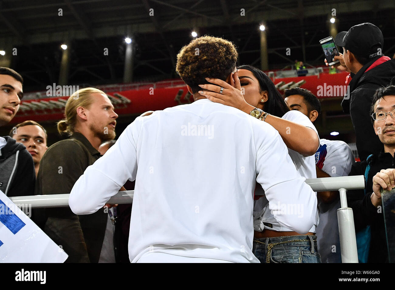 Dele Ali of England kisses his girlfriend Ruby Mae to celebrate after ...