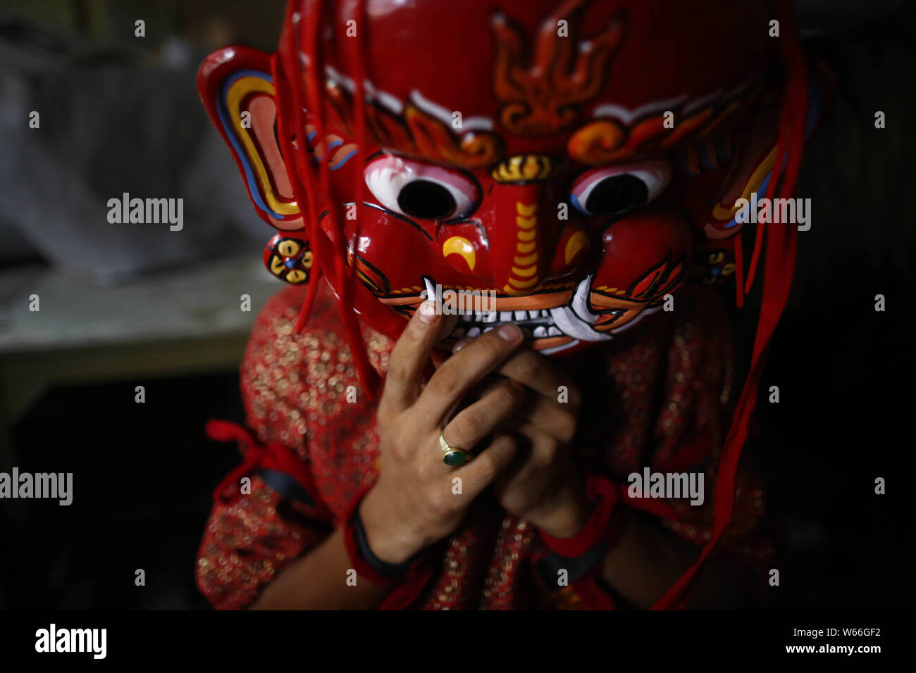 July 31, 2019, Lalitpur, Nepal: A person dressed as a Lakhey gets ready ...