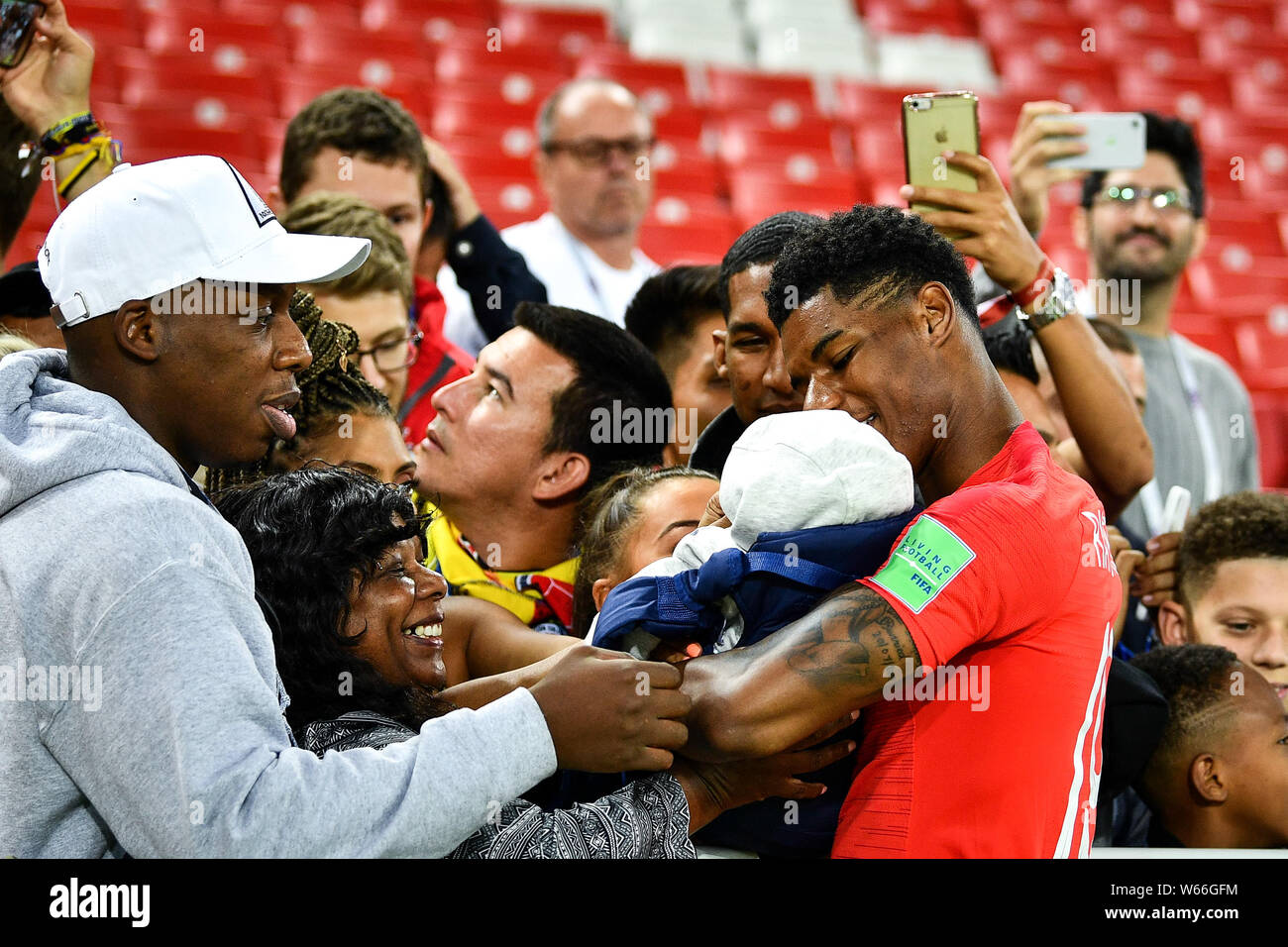 Marcus Rashford of England celebrates with his families and friends ...