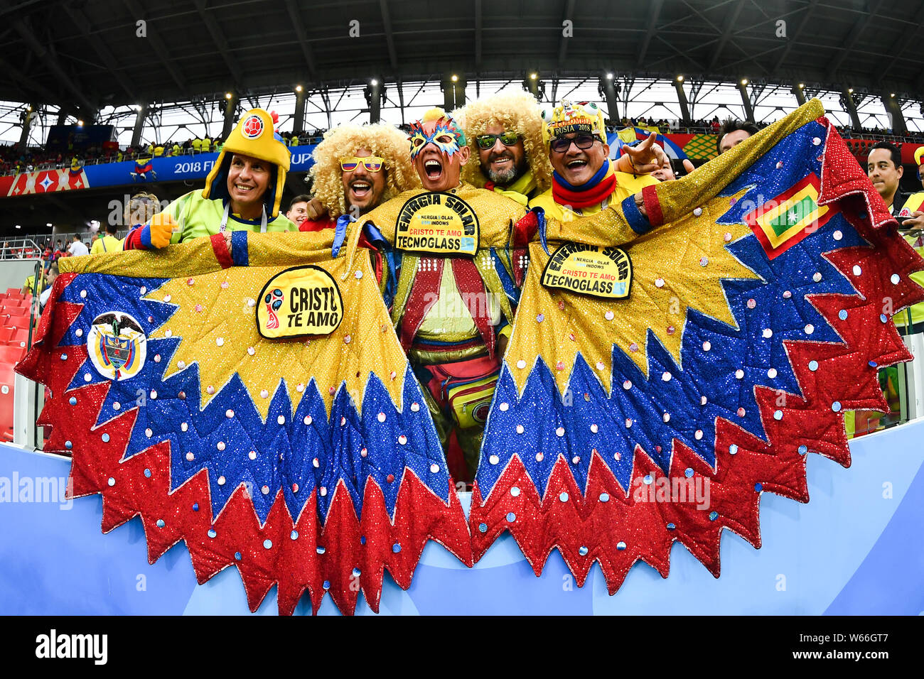 Colombian fans who are dressed up show their support for Columbia in ...