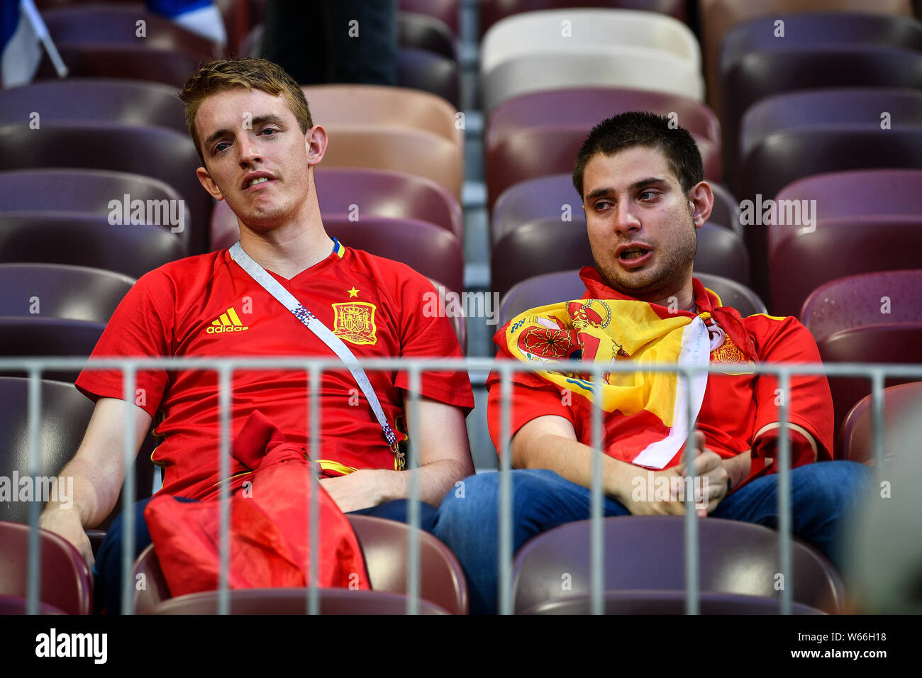 Spanish fans weep at the Luzhniki Stadium after Spain was defeated by ...