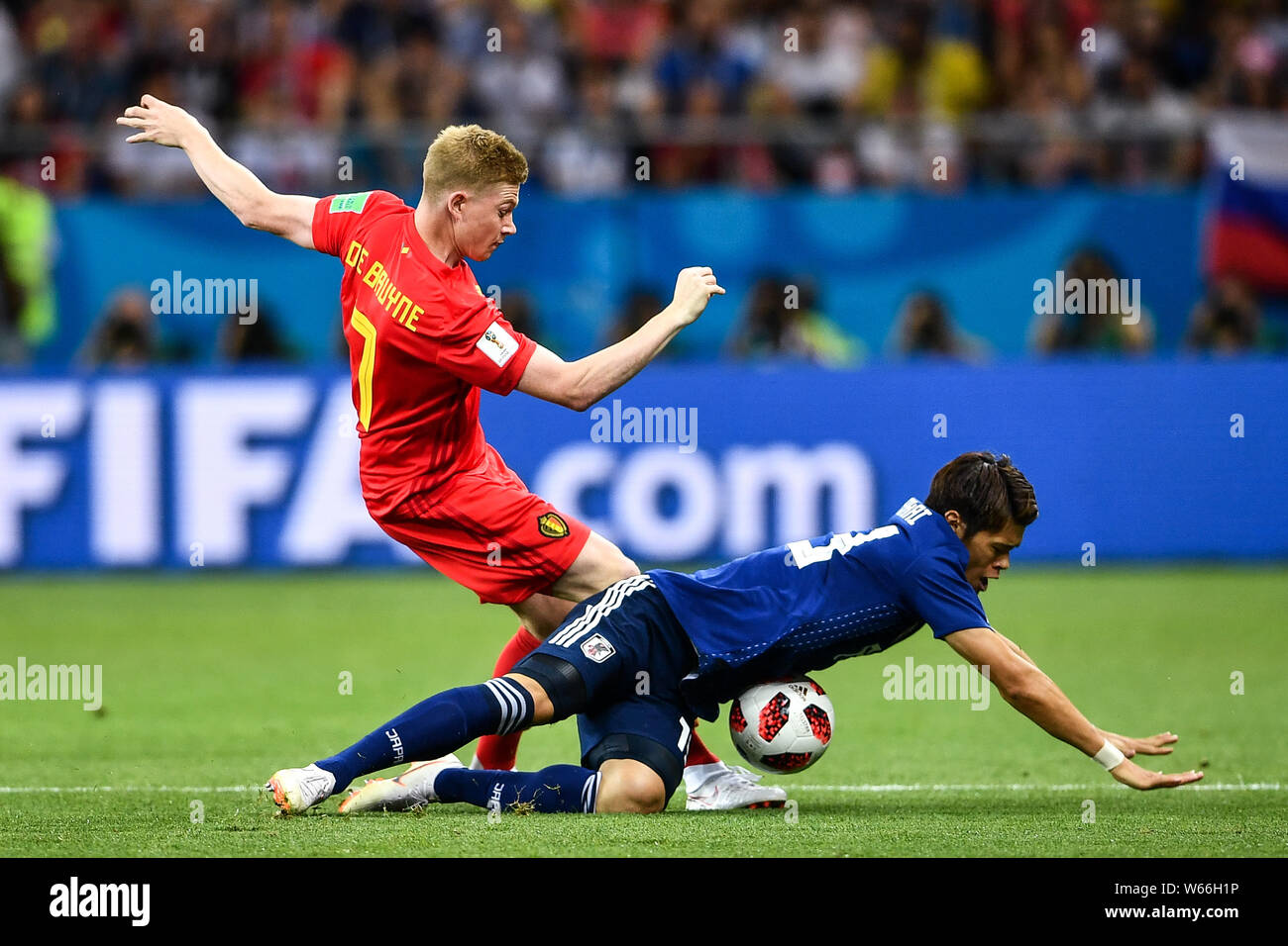 Kevin De Bruyne of Belgium, left, challenges Hiroki Sakai of Japan in ...