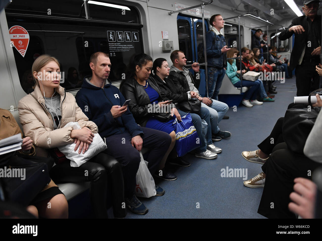 Commuters take a subway train on the Moscow Metro in Moscow, Russia, 4 ...