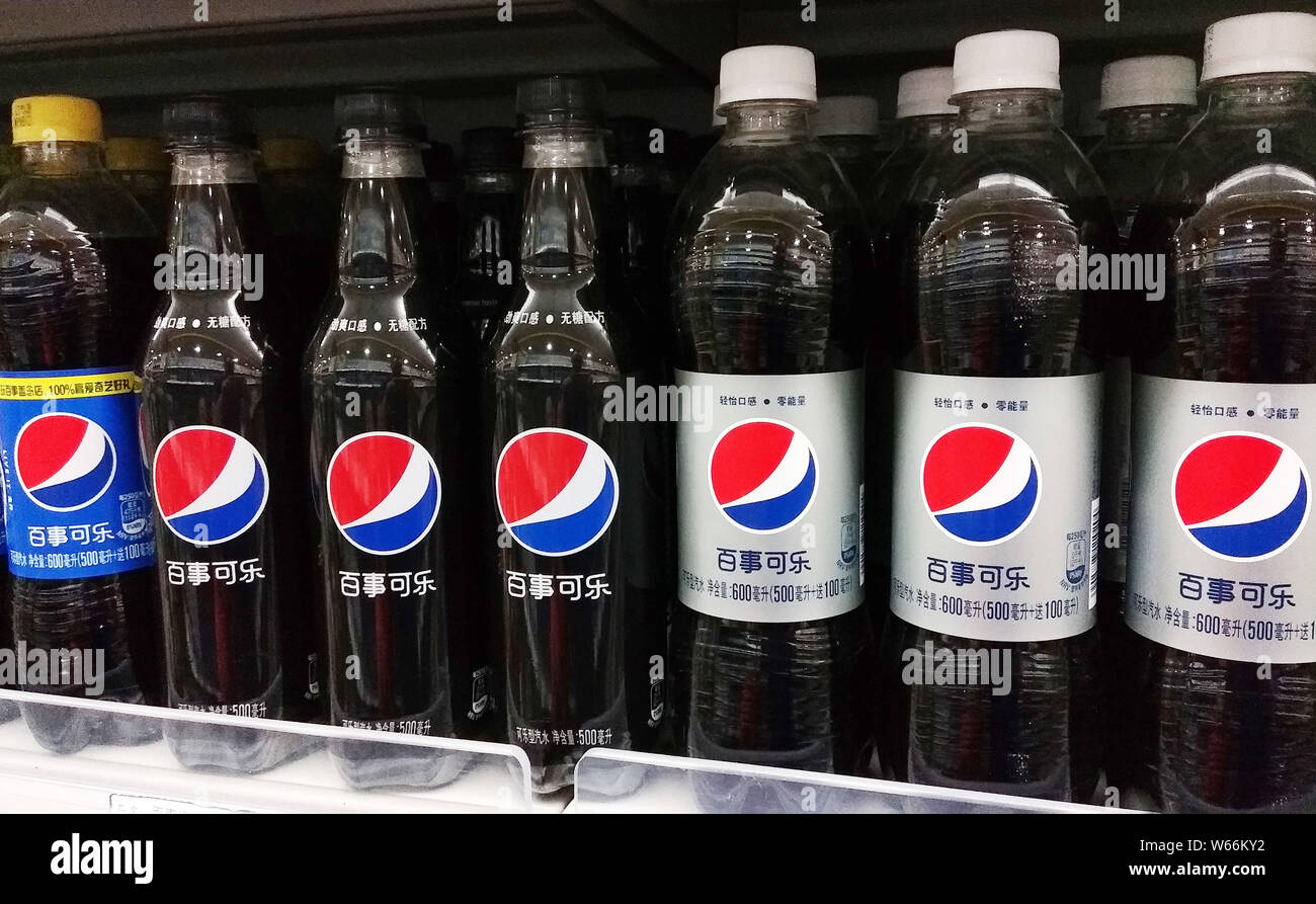 --FILE--Bottles of Pepsi coke are pictured at a supermarket in ...