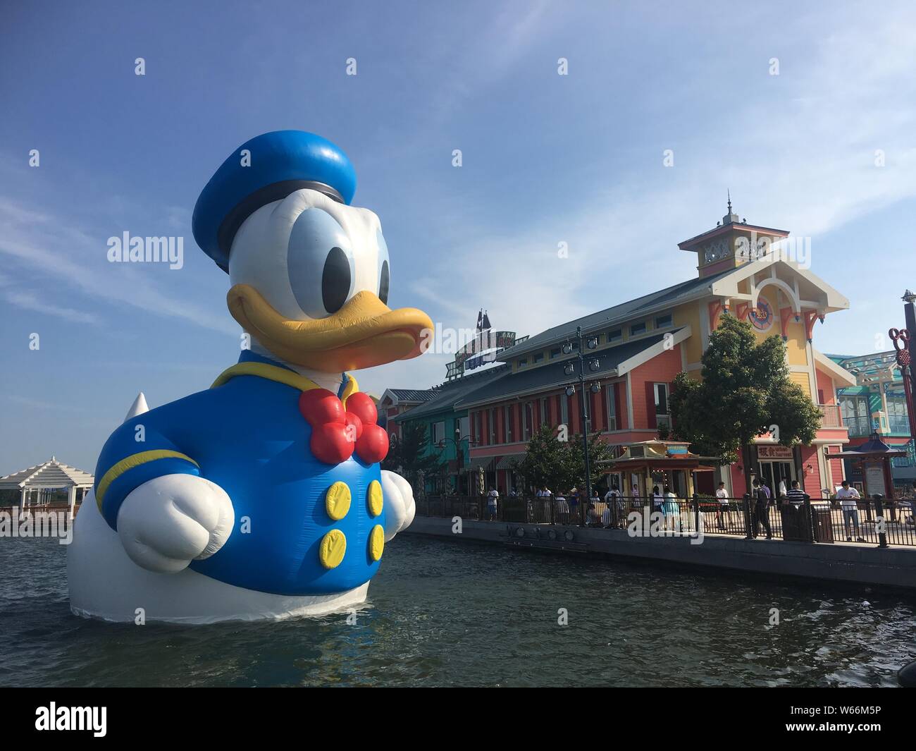 An 11-meter-tall inflatable Donald Duck is on display at the lakeside ...