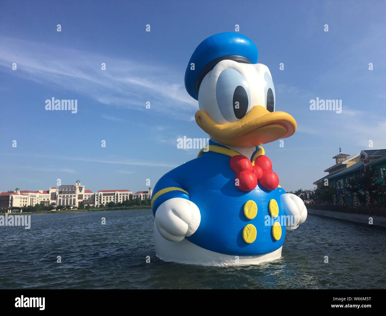 An 11-meter-tall inflatable Donald Duck is on display at the lakeside ...