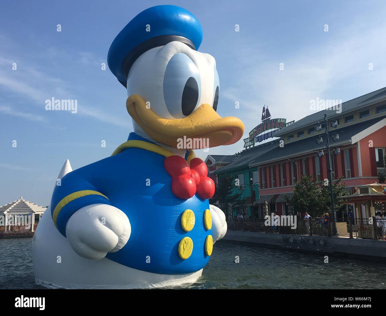 An 11-meter-tall inflatable Donald Duck is on display at the lakeside ...