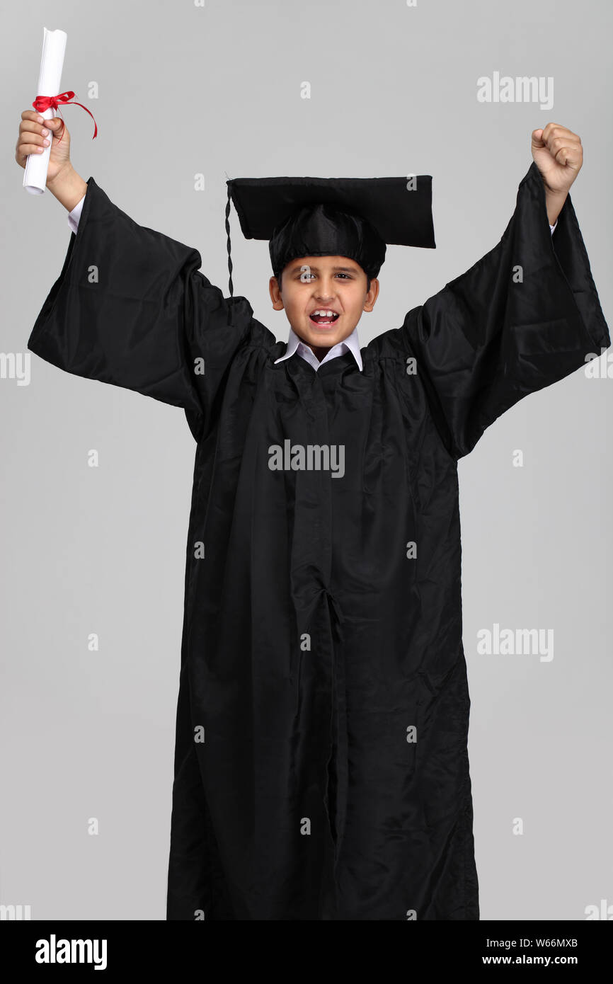 Boy celebrating graduation degree Stock Photo - Alamy