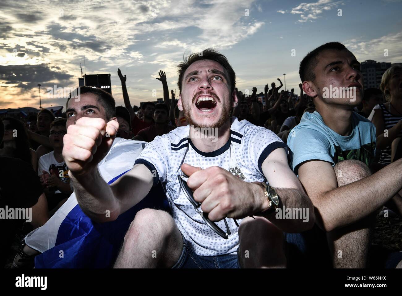Russian fans celebrate as they watch the Round of 16 match between ...