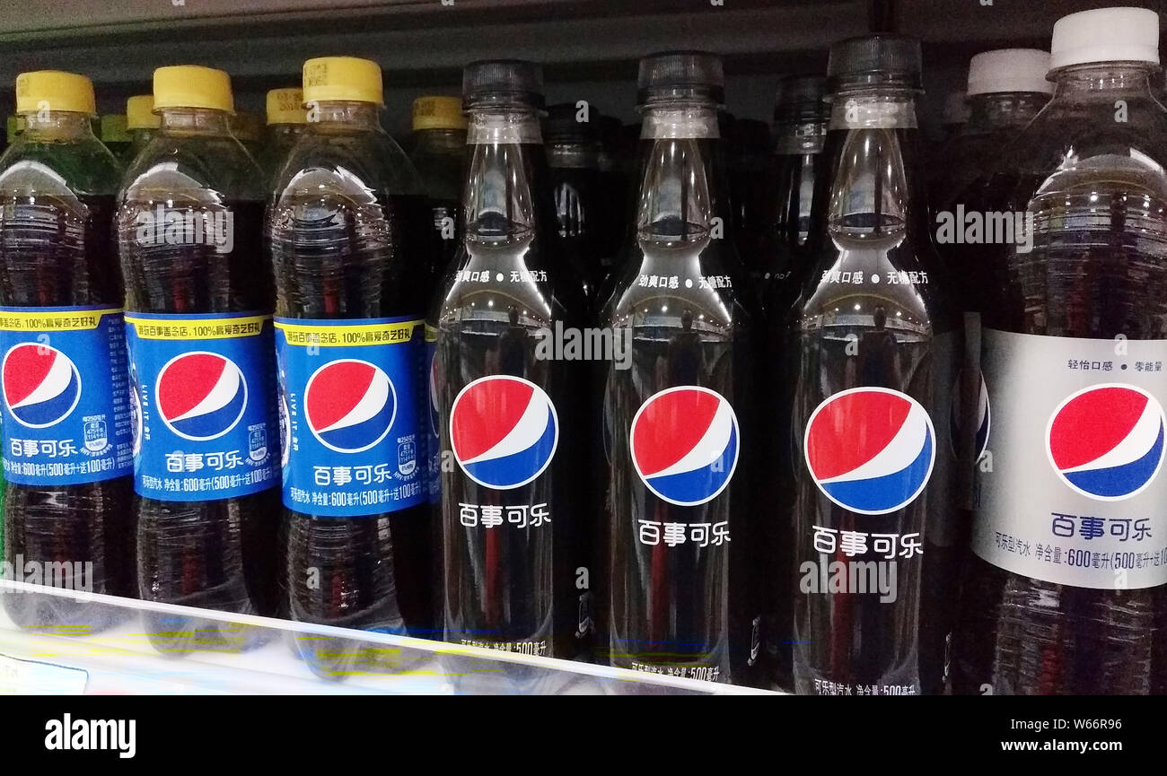 --FILE--Bottles of Pepsi coke are pictured at a supermarket in ...