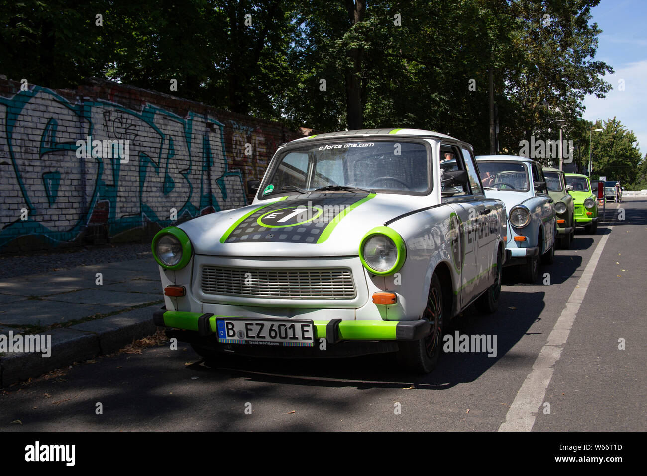 Old Trabant cars near the Berlin Wall monument in Berlin, Germany Stock ...