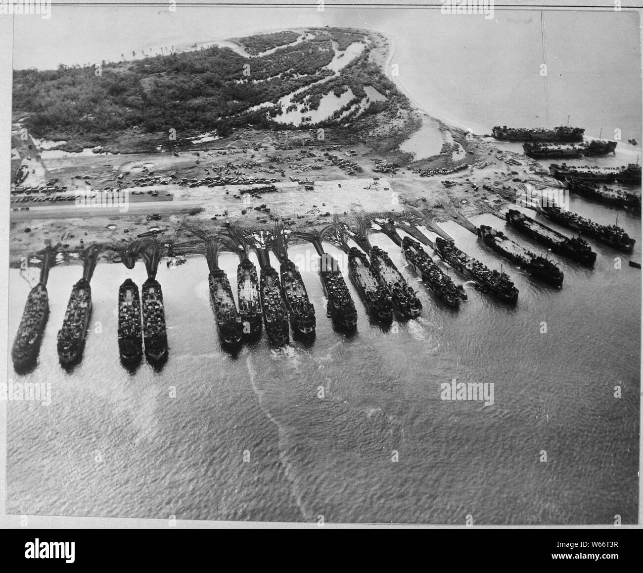 LST's pouring army equipment ashore on Leyte Islands in the Philippines ...