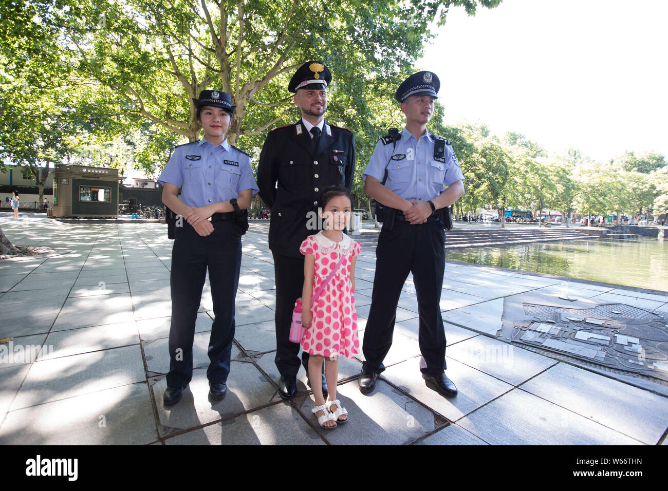An Italian police officer conducts joint patrols with Chinese police ...